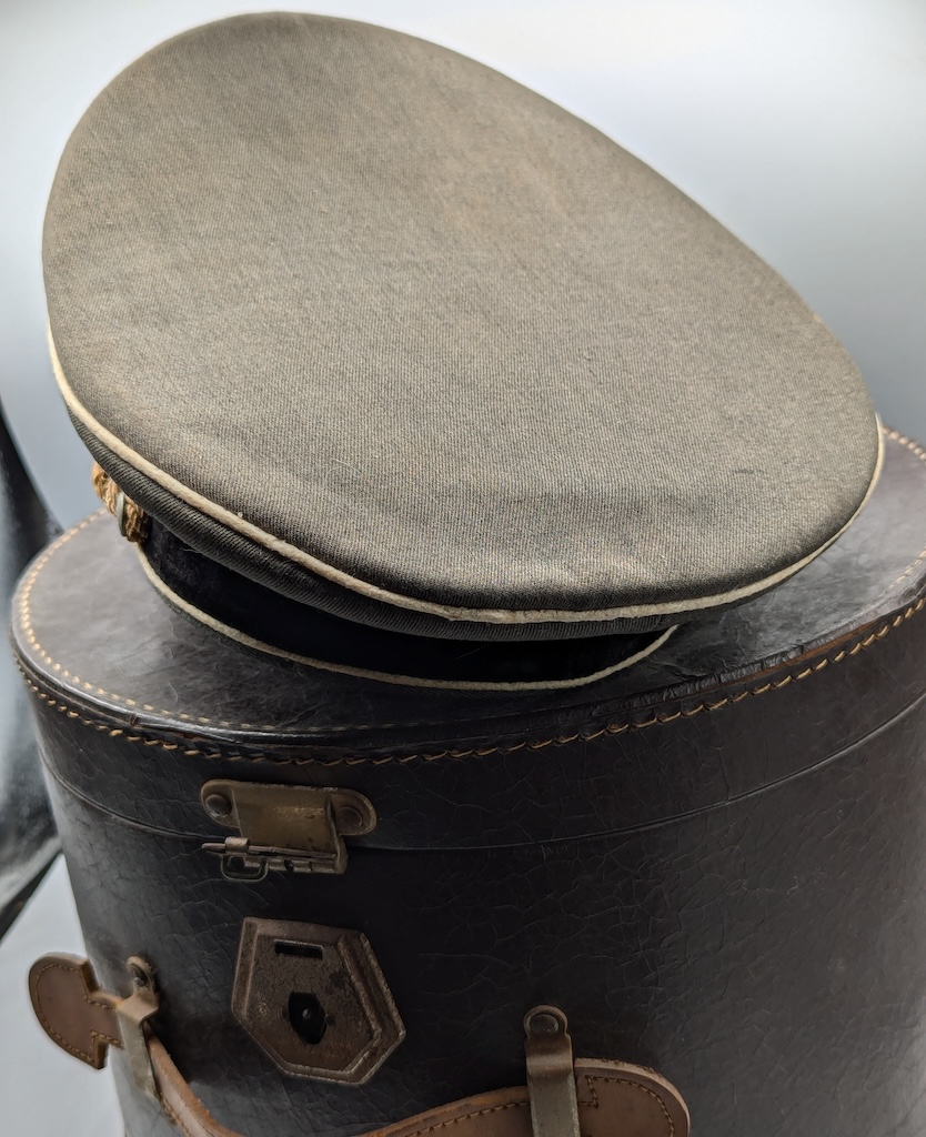 AMAZING WAFFEN SS TOTENKOPF OFFICER VISOR CAP with original case of issue