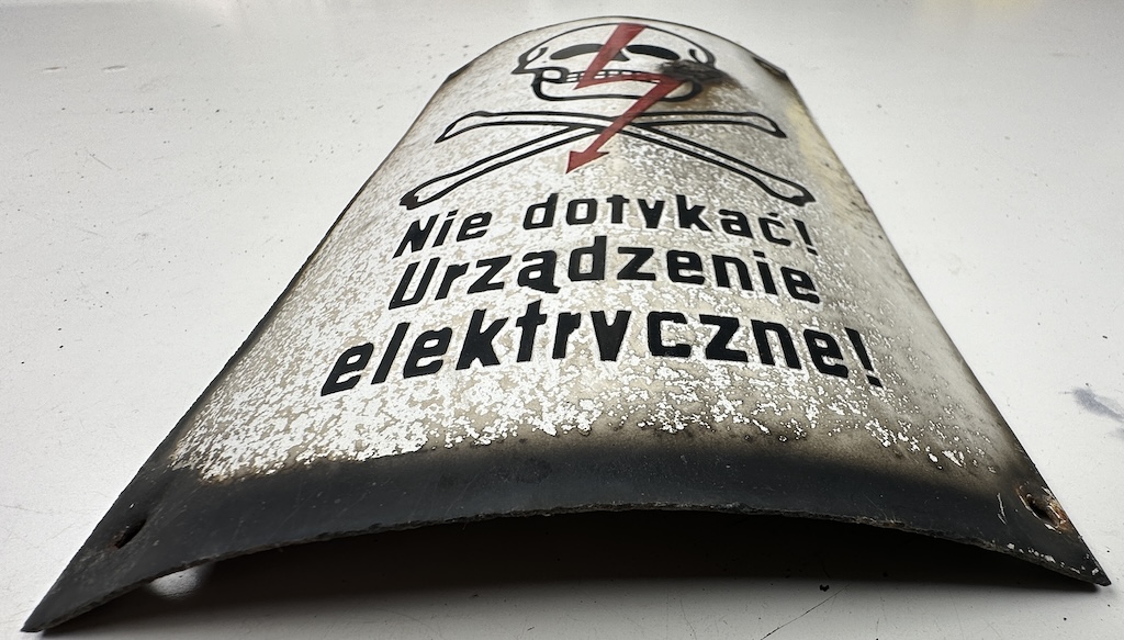 Concentration camp AUSCHWITZ BIRKENAU fences achtung minen skull metal sign