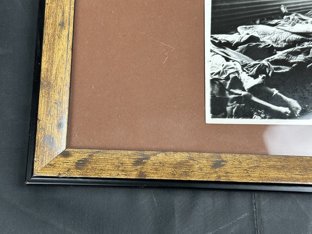 Zyklon B canister label in frame with holocaust photo Concentration Camp