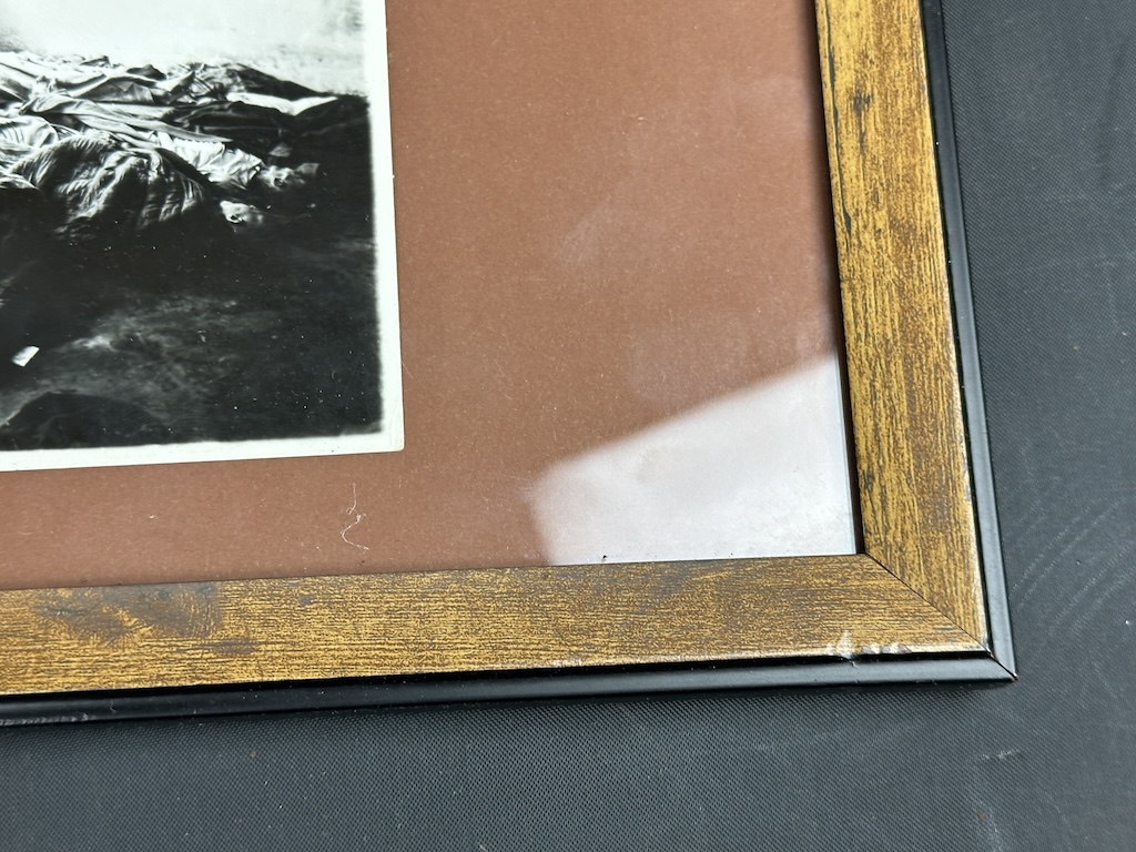 Zyklon B canister label in frame with holocaust photo Concentration Camp