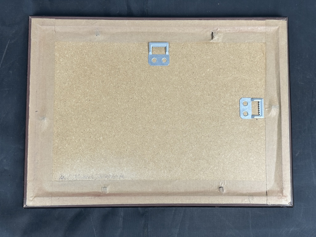 Zyklon B canister label in frame with holocaust photo Concentration Camp
