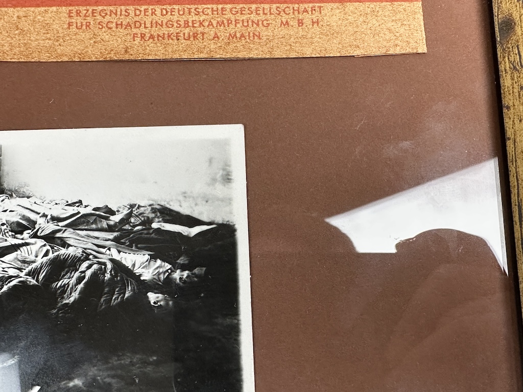 Zyklon B canister label in frame with holocaust photo Concentration Camp